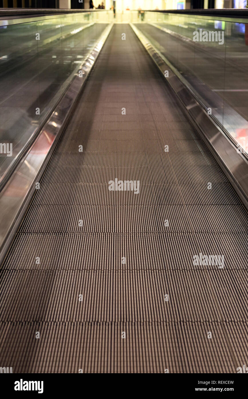 Moving sidewalk in airport Stock Photo - Alamy