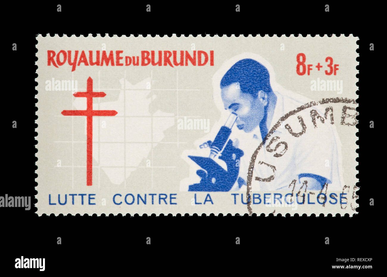 Semi postal stamp from Burundi depicting a scientist with a microscope ...