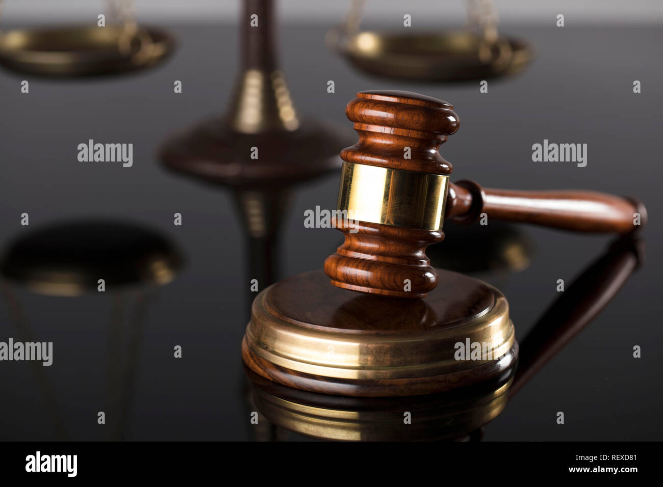 Law concept. Judge's gavel and scale on gray background Stock Photo - Alamy