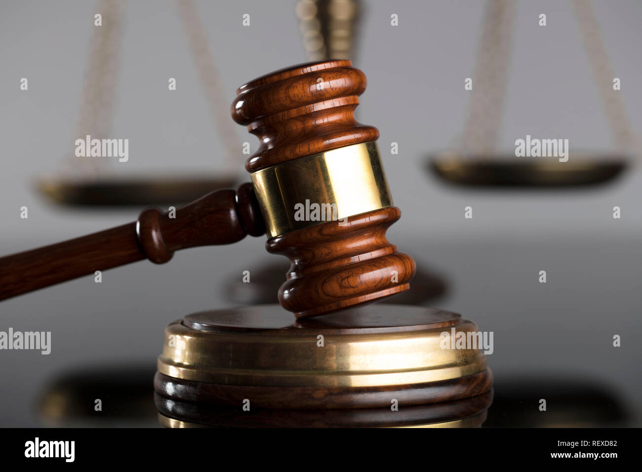 Law concept. Judge's gavel and scale on gray background Stock Photo - Alamy