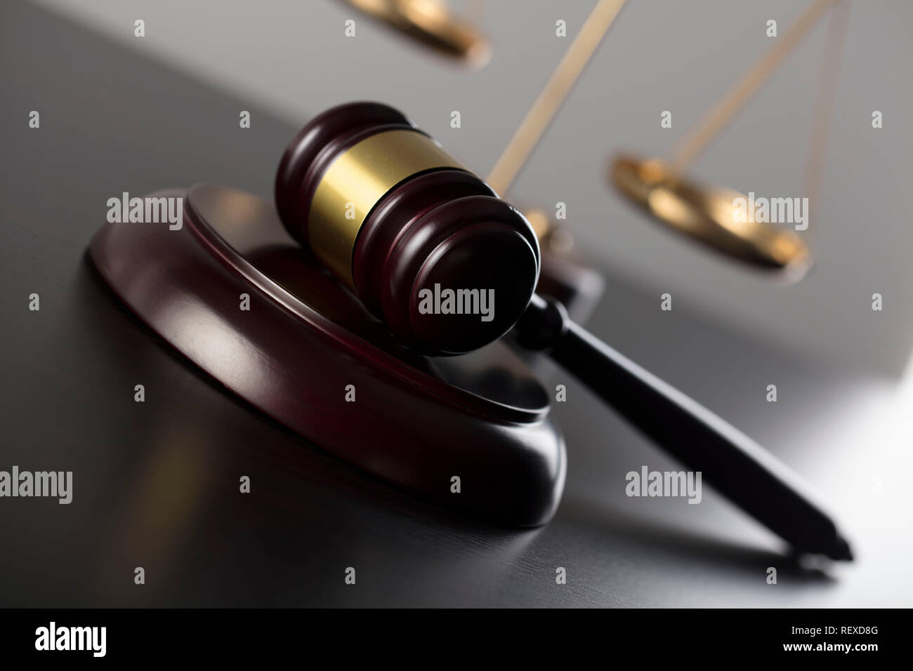Law concept. Judge's gavel and scale on gray background Stock Photo - Alamy
