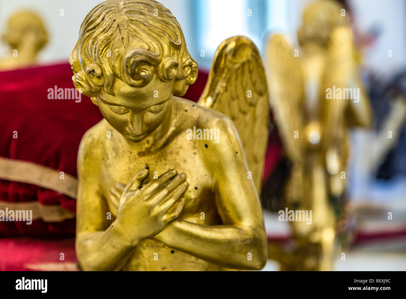 angel holding hands on heart Stock Photo - Alamy