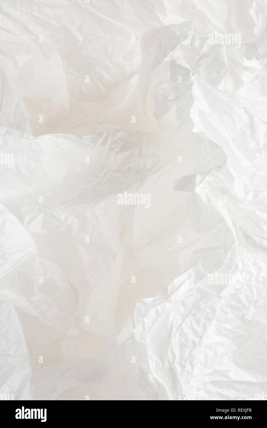 A crumpled piece of white thin packaging paper Stock Photo - Alamy