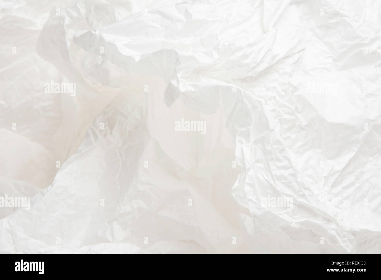 A crumpled piece of white thin packaging paper Stock Photo - Alamy