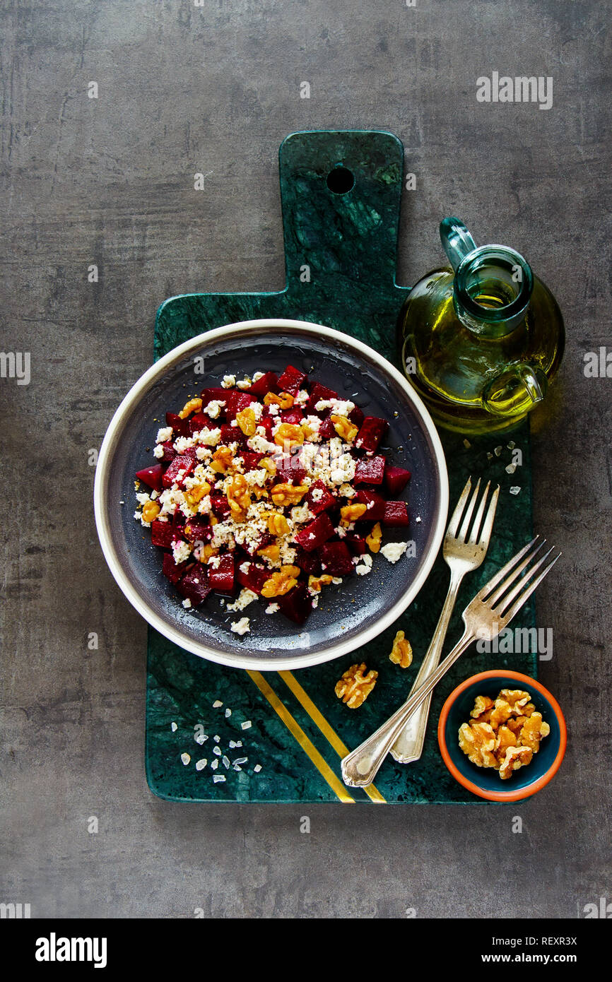 Homemade roasted beetroot salad with walnut and feta cheese flat-lay ...