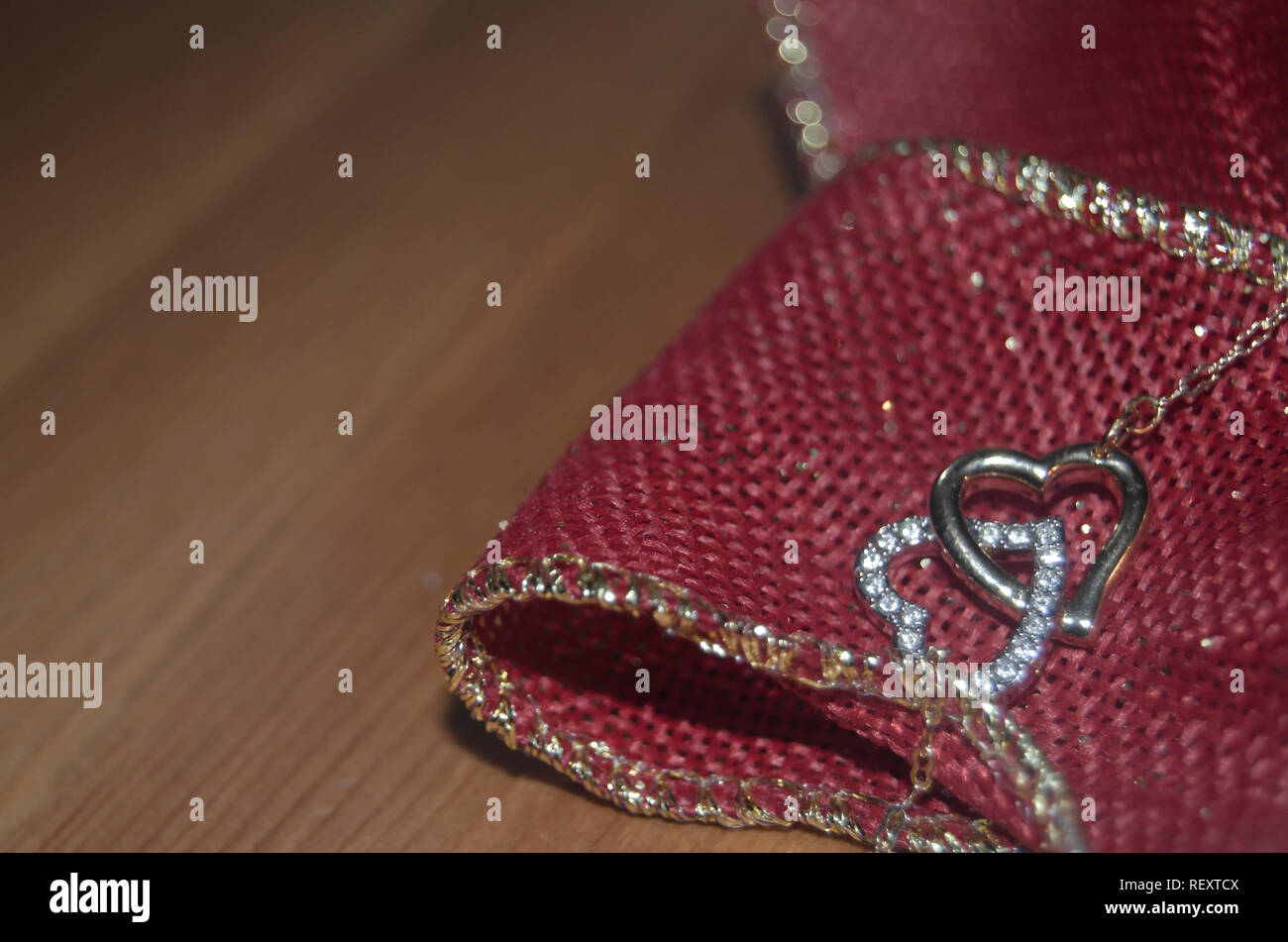 Two heart necklace hi-res stock photography and images - Alamy