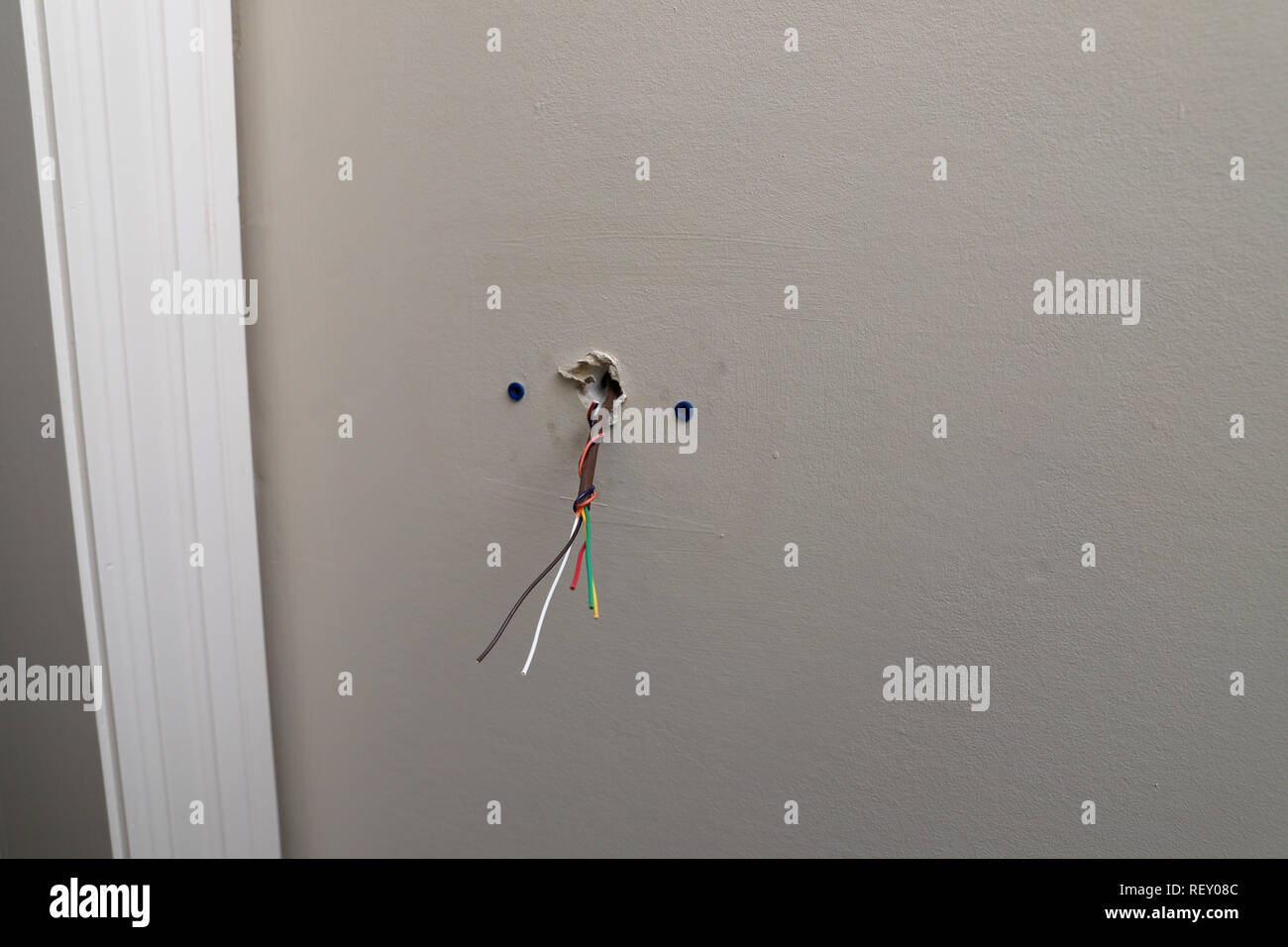 Control wire for thermostat used with a HVAC unit, coming out of wall ...