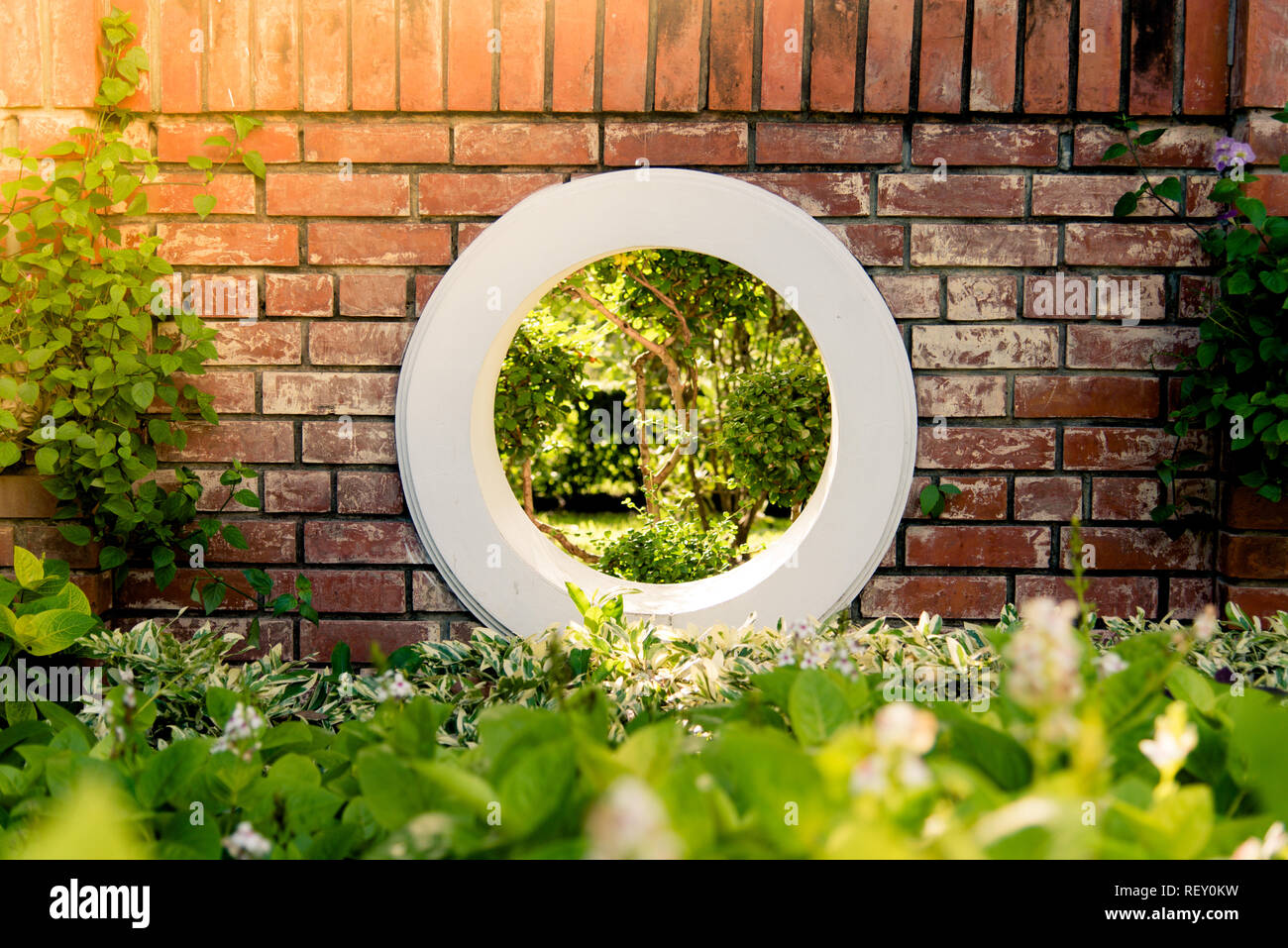 Brick window garden interior hi-res stock photography and images - Alamy