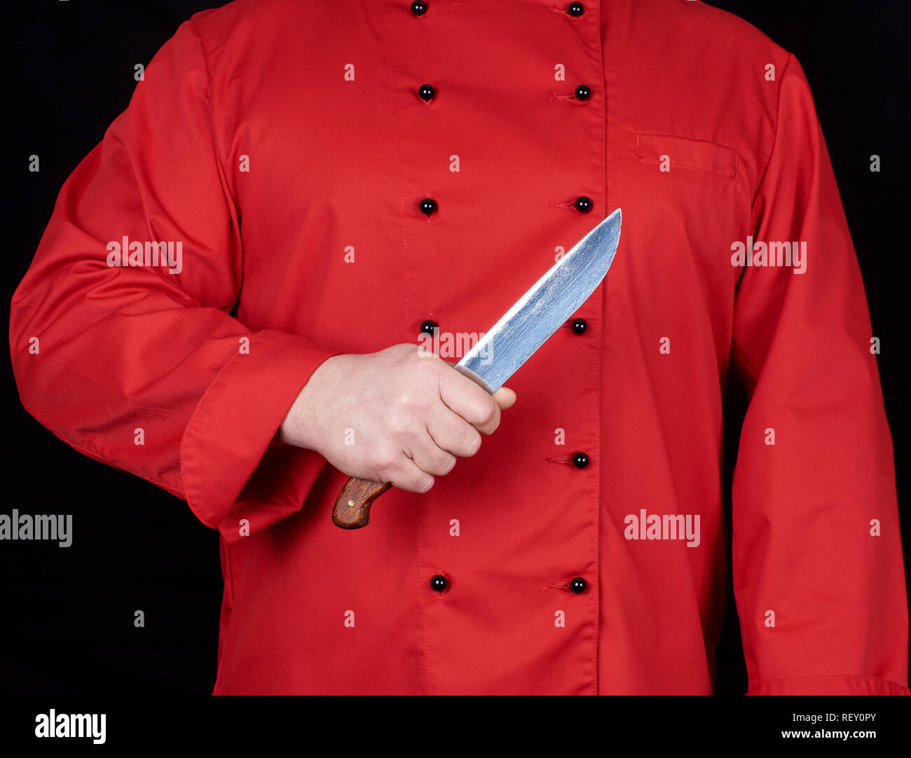 chef in red uniform holding a kitchen knife in his right hand, black ...