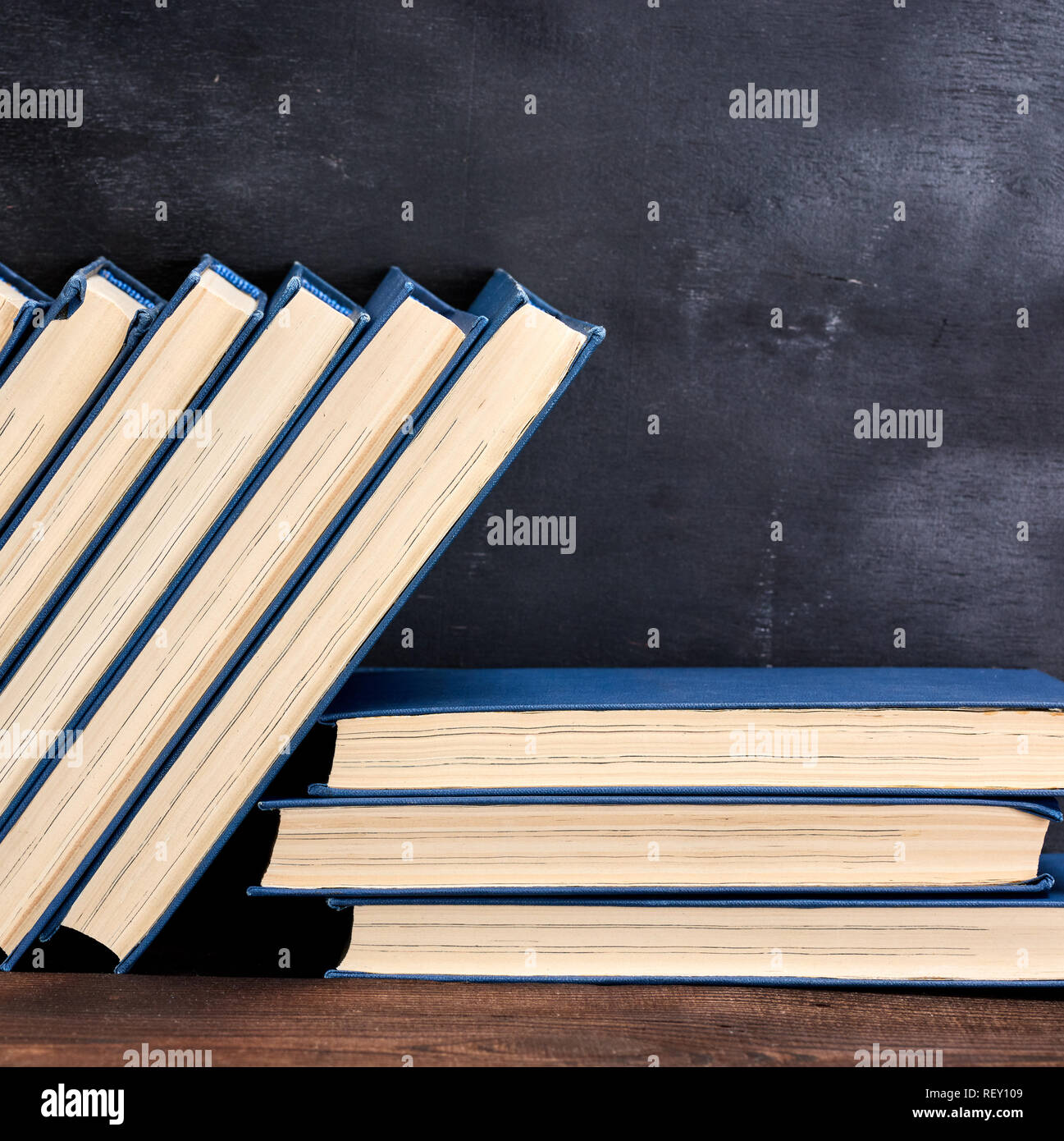Stacked books in black hi-res stock photography and images - Alamy