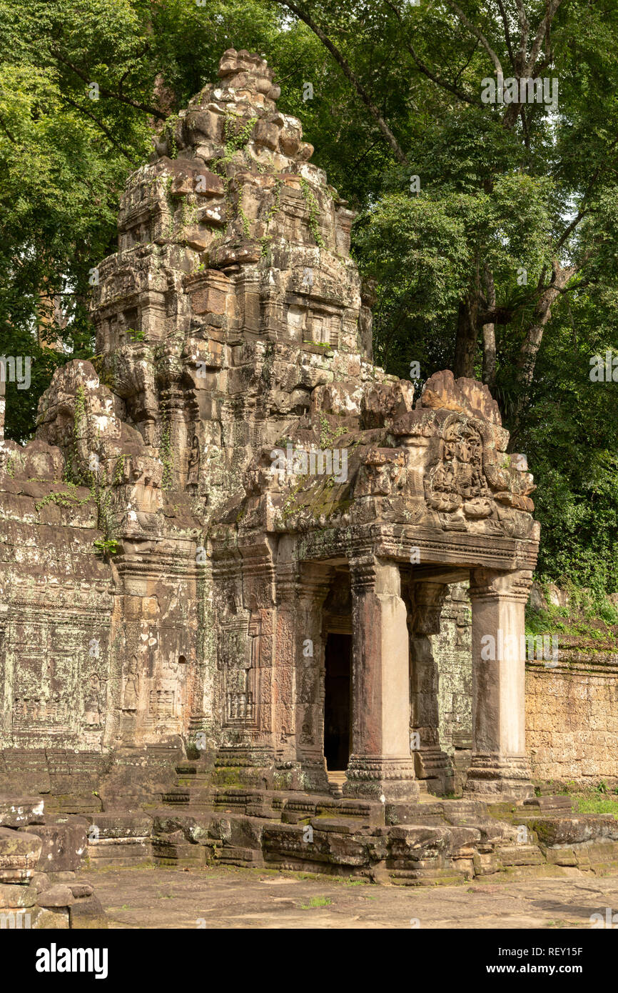Stone portico with decorative tower in trees Stock Photo - Alamy
