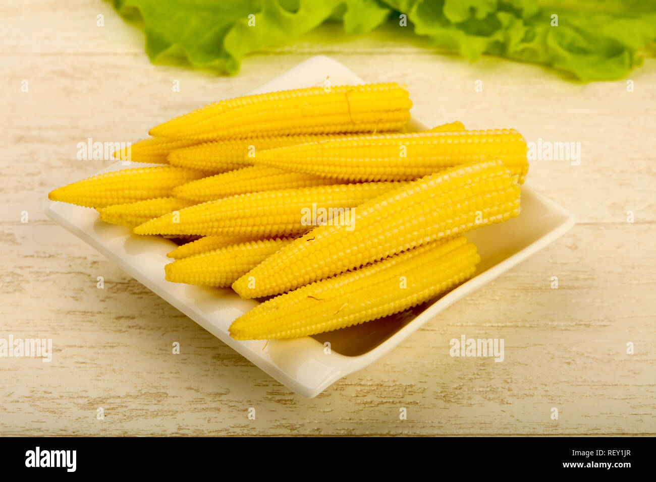 Young raw baby corn Stock Photo - Alamy