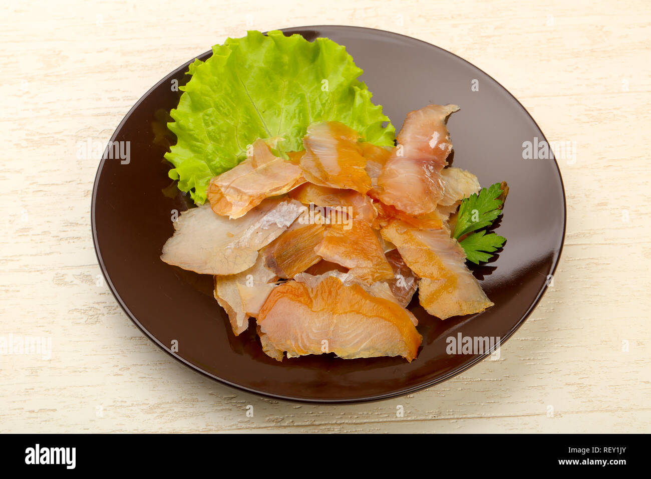 Smoked catfish fillet carpaccio Stock Photo - Alamy