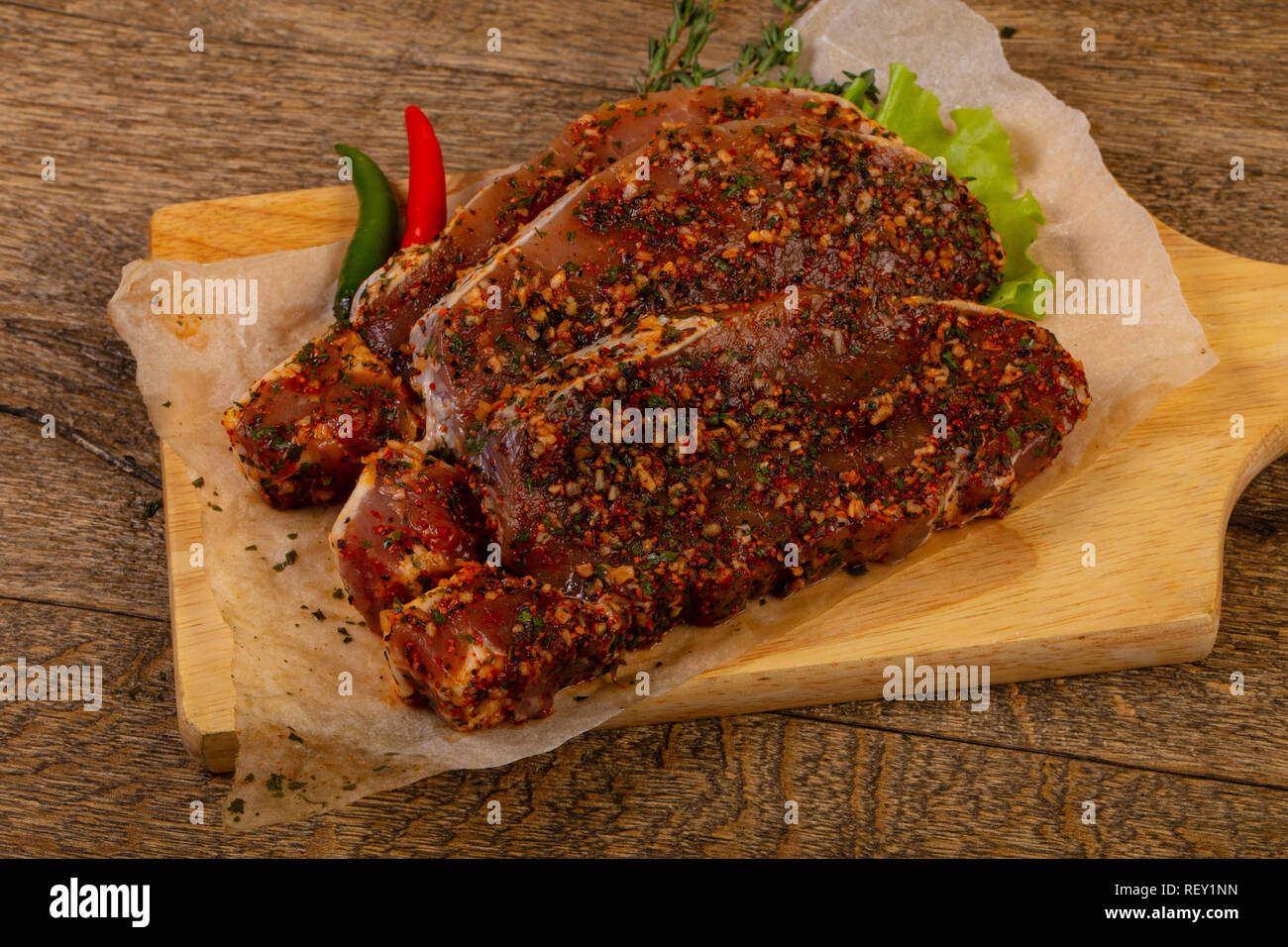 Raw marinated pork steak ready for cooking Stock Photo - Alamy