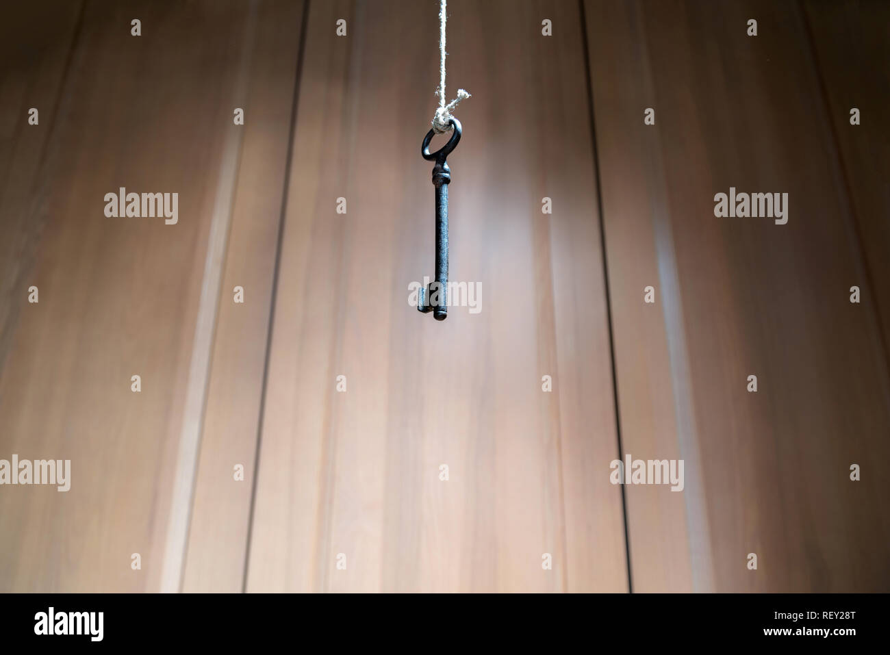 Gold key hanging hi-res stock photography and images - Alamy