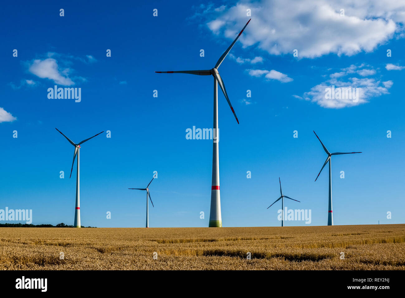 Some wind power plants in agricultural countryside Stock Photo - Alamy