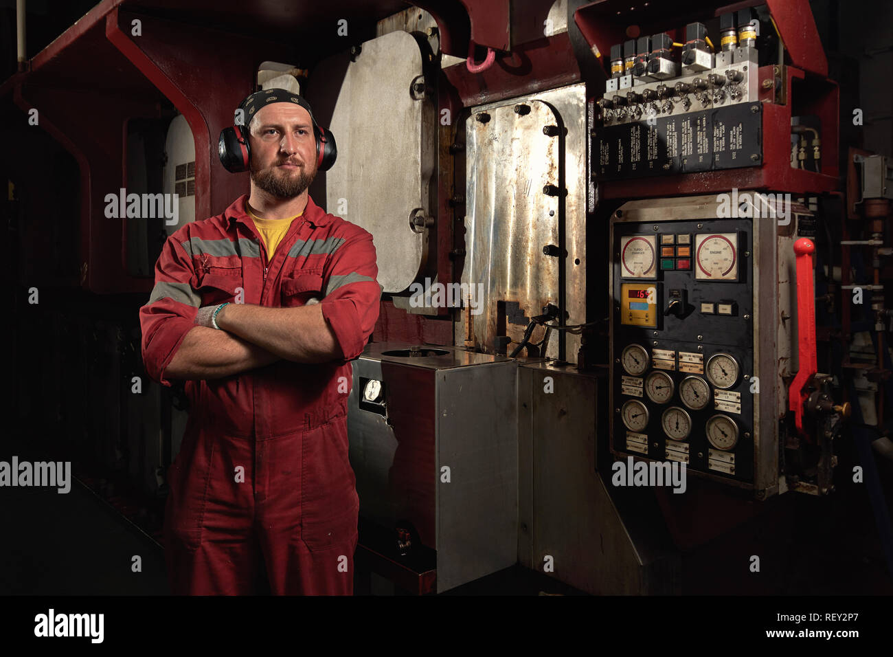 Mechanic ship main engine on dark background. Industrial marine engine ...