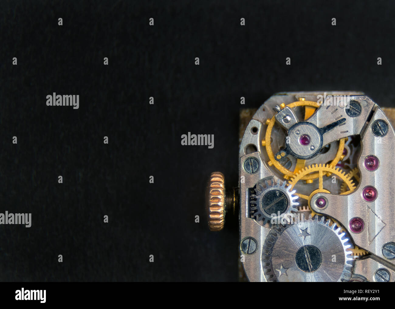 Clockwork background. Close-up of inside of old vintage clock pocket ...