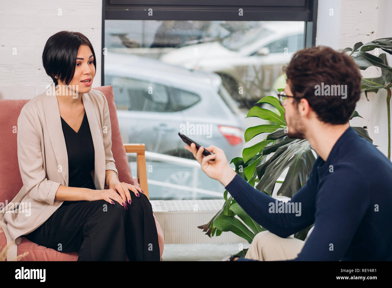 handsome man has orginized the interview with a talented celebrity ...