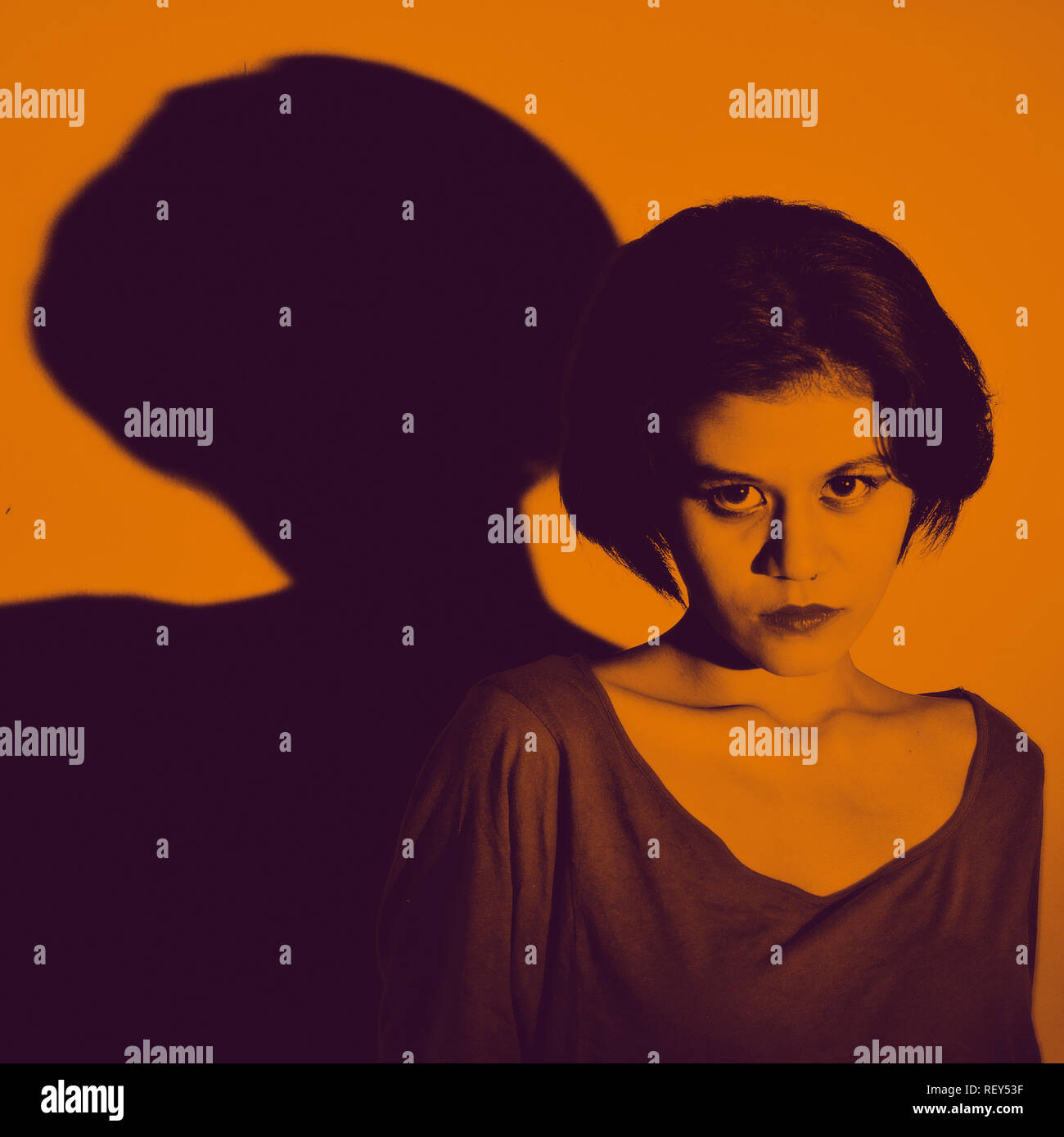 woman stalked by her shadow Stock Photo - Alamy