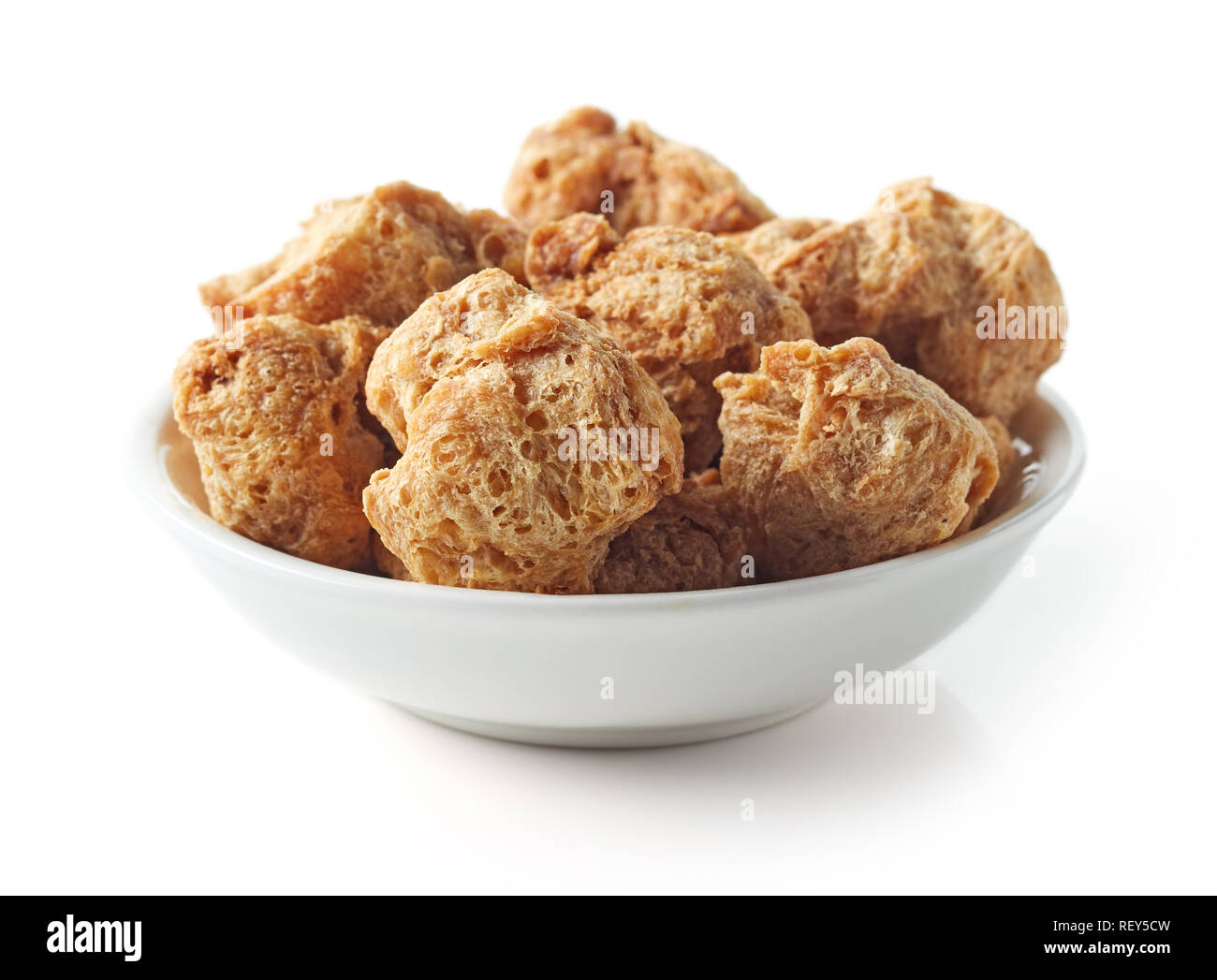 Bowl of soya chunks isolated on white background Stock Photo - Alamy