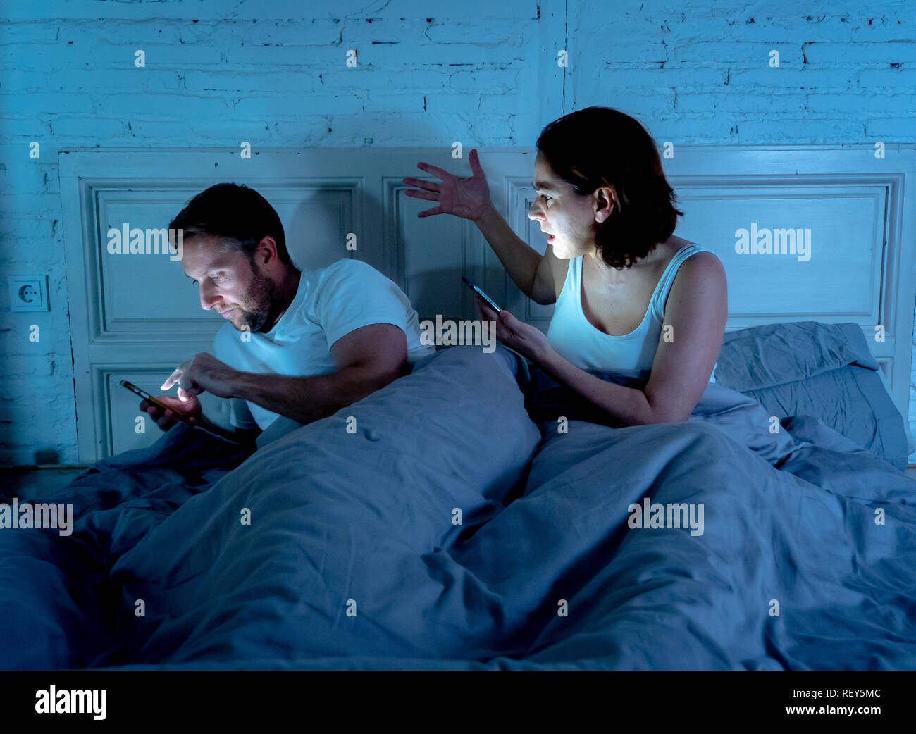 Lifestyle of mobile addicted man husband and angry frustrated wife ...