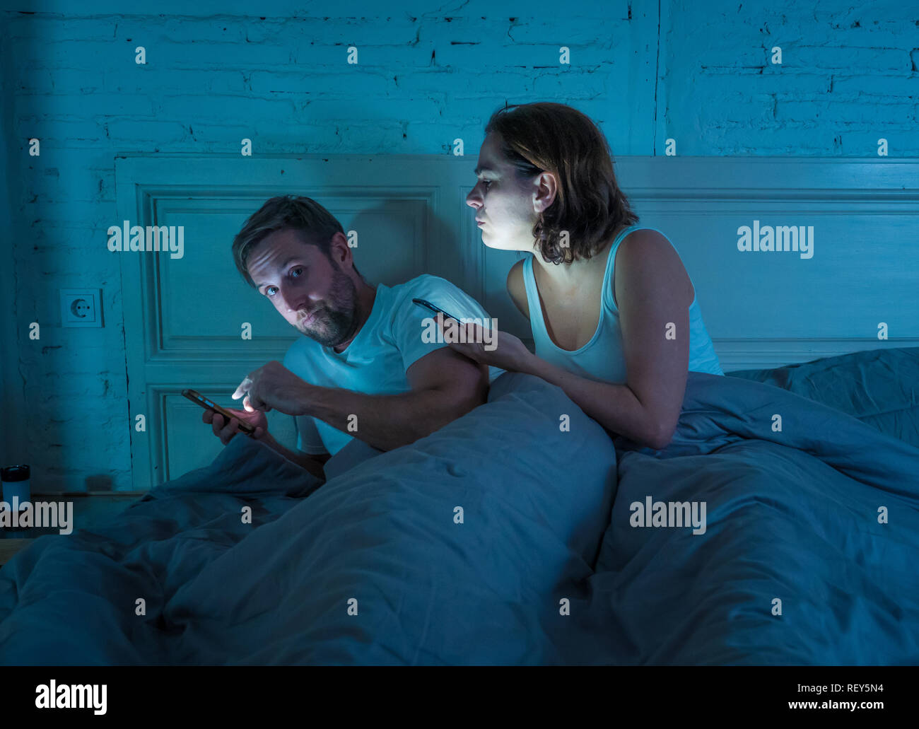 Lifestyle of mobile addicted man husband and angry frustrated wife ...