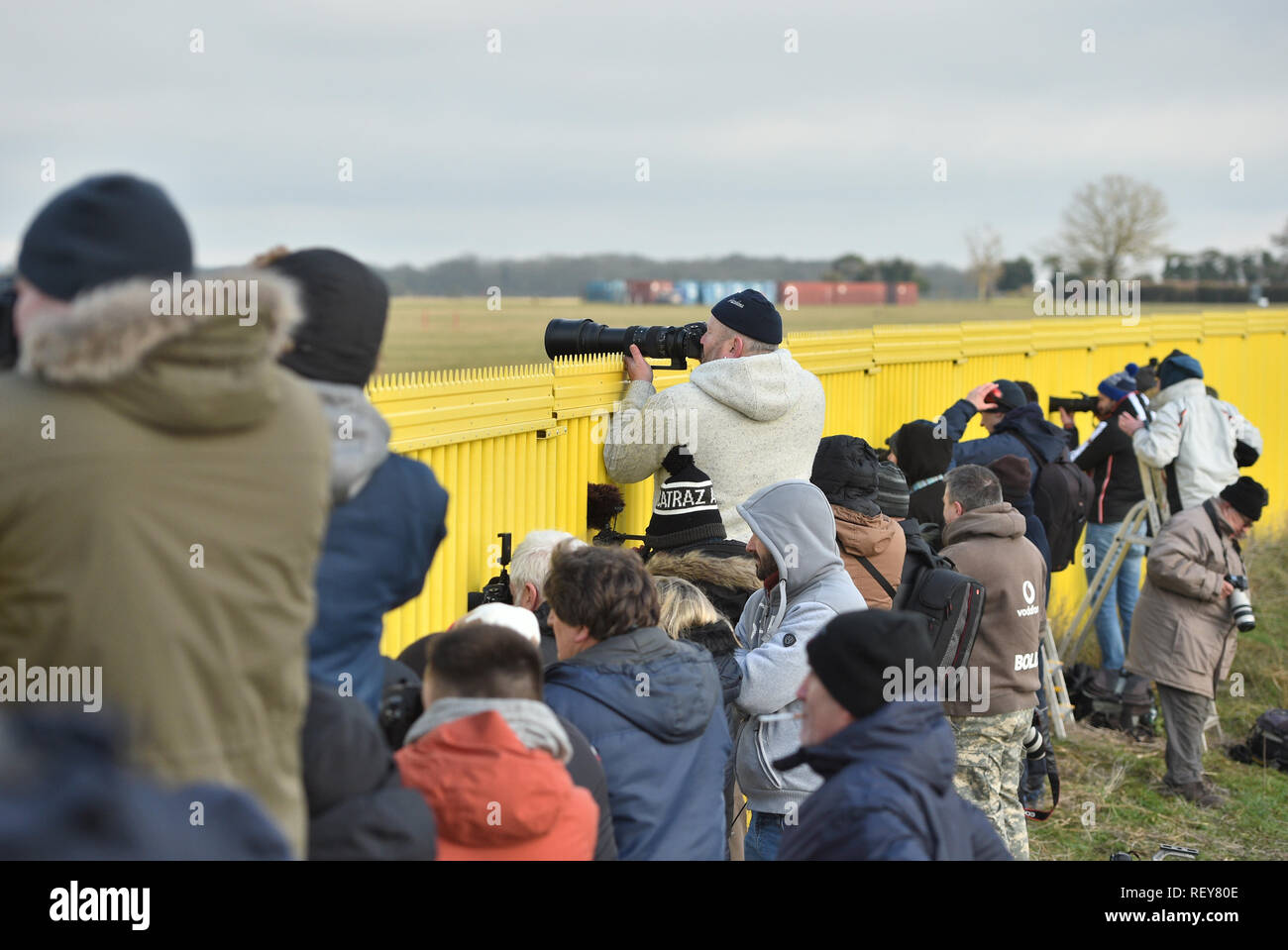 Plane enthusiasts line the perimeter fence at RAF Marham in Norfolk to ...