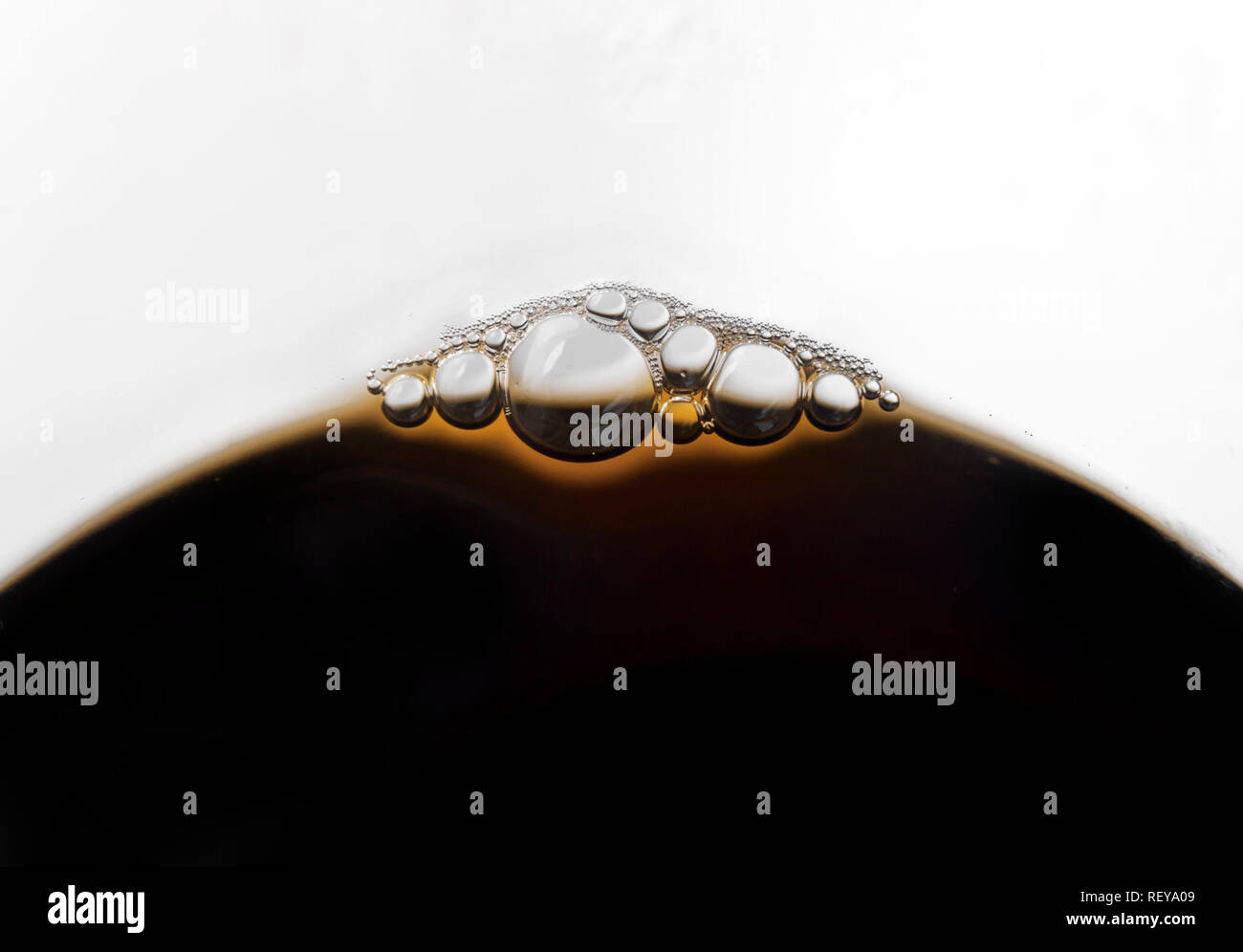 Black coffee filter bubble with white background foam Stock Photo - Alamy