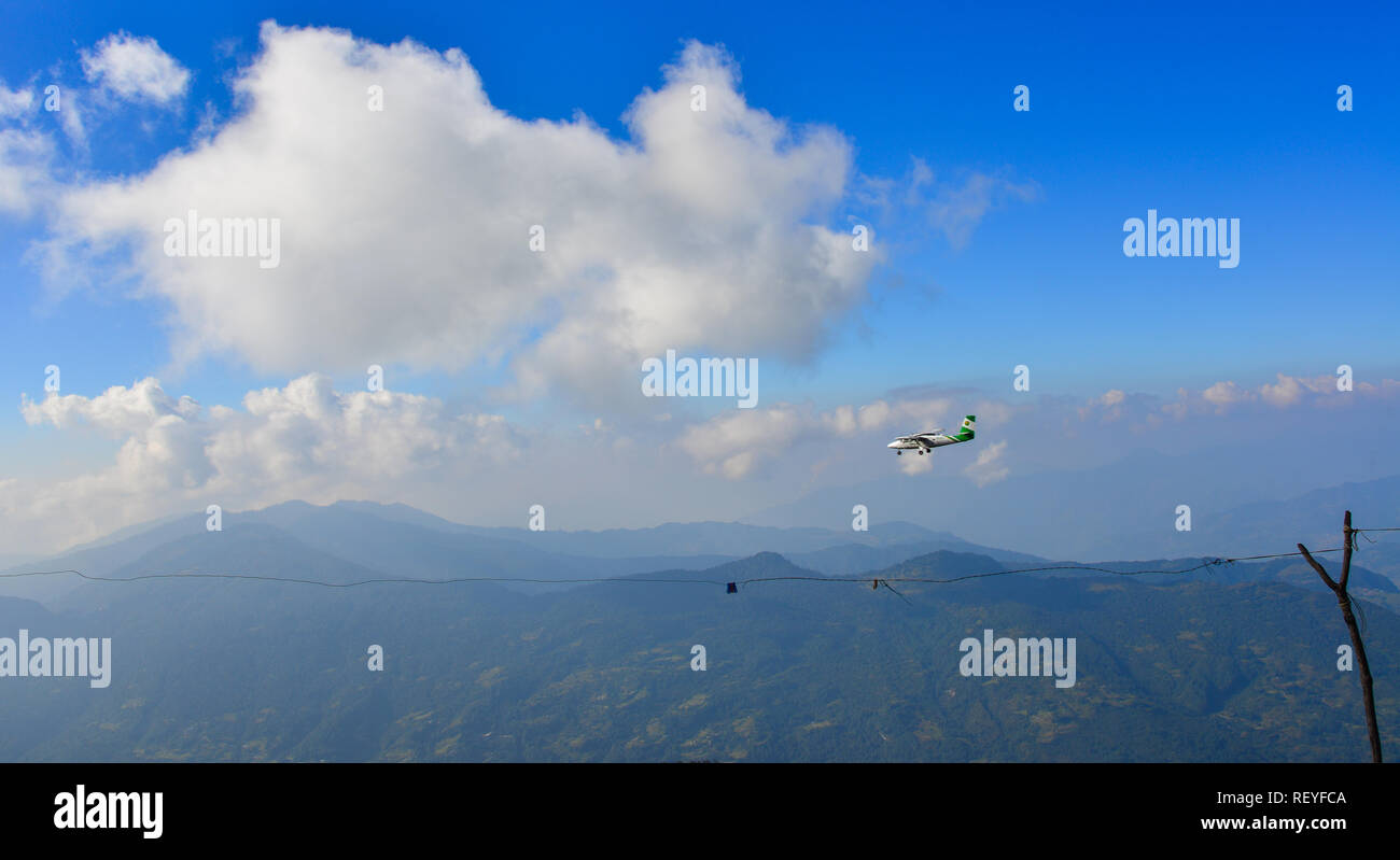 Aeroplane flying over mountain peak hi-res stock photography and images ...