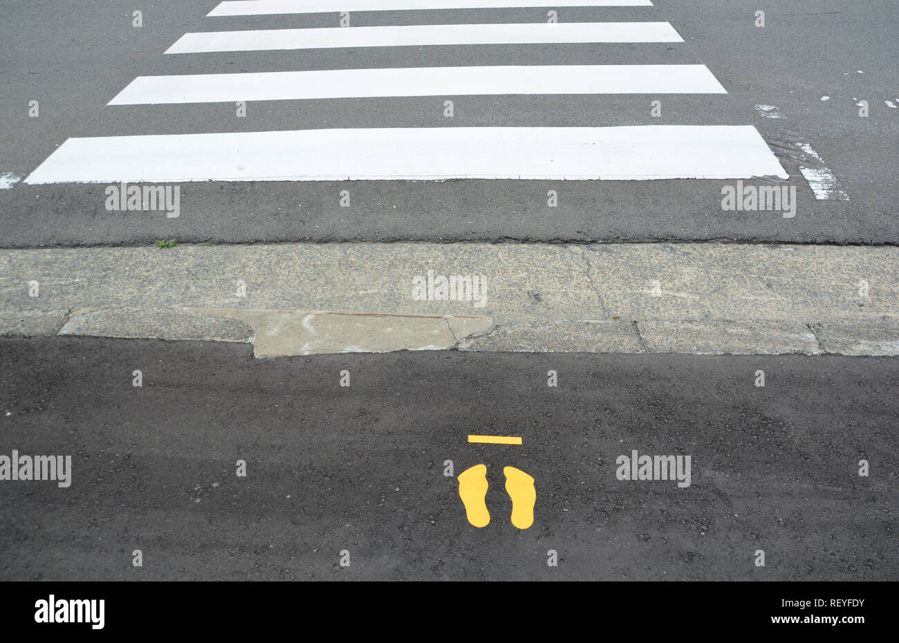 Zebra crosswalk on the road for safety when people walking cross the ...