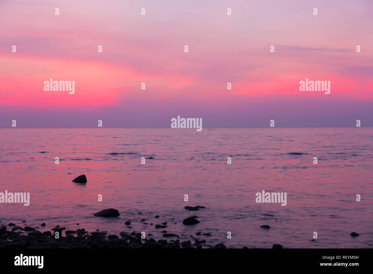 The sea sunset. Pink landscape Stock Photo - Alamy
