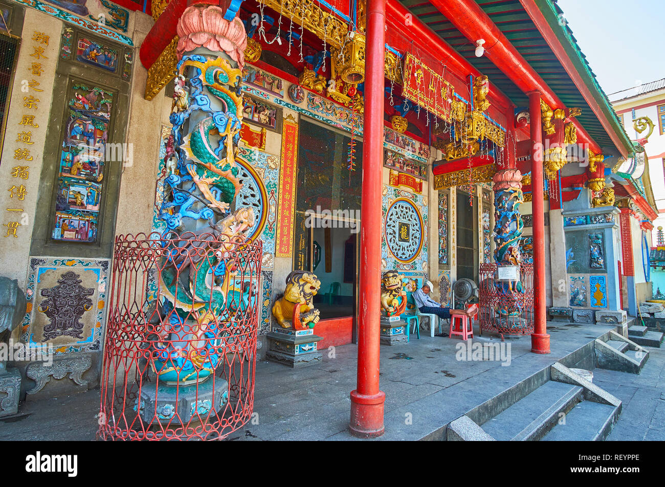 YANGON, MYANMAR - FEBRUARY 17, 2018: Ornate porch of Long Shan Tang ...