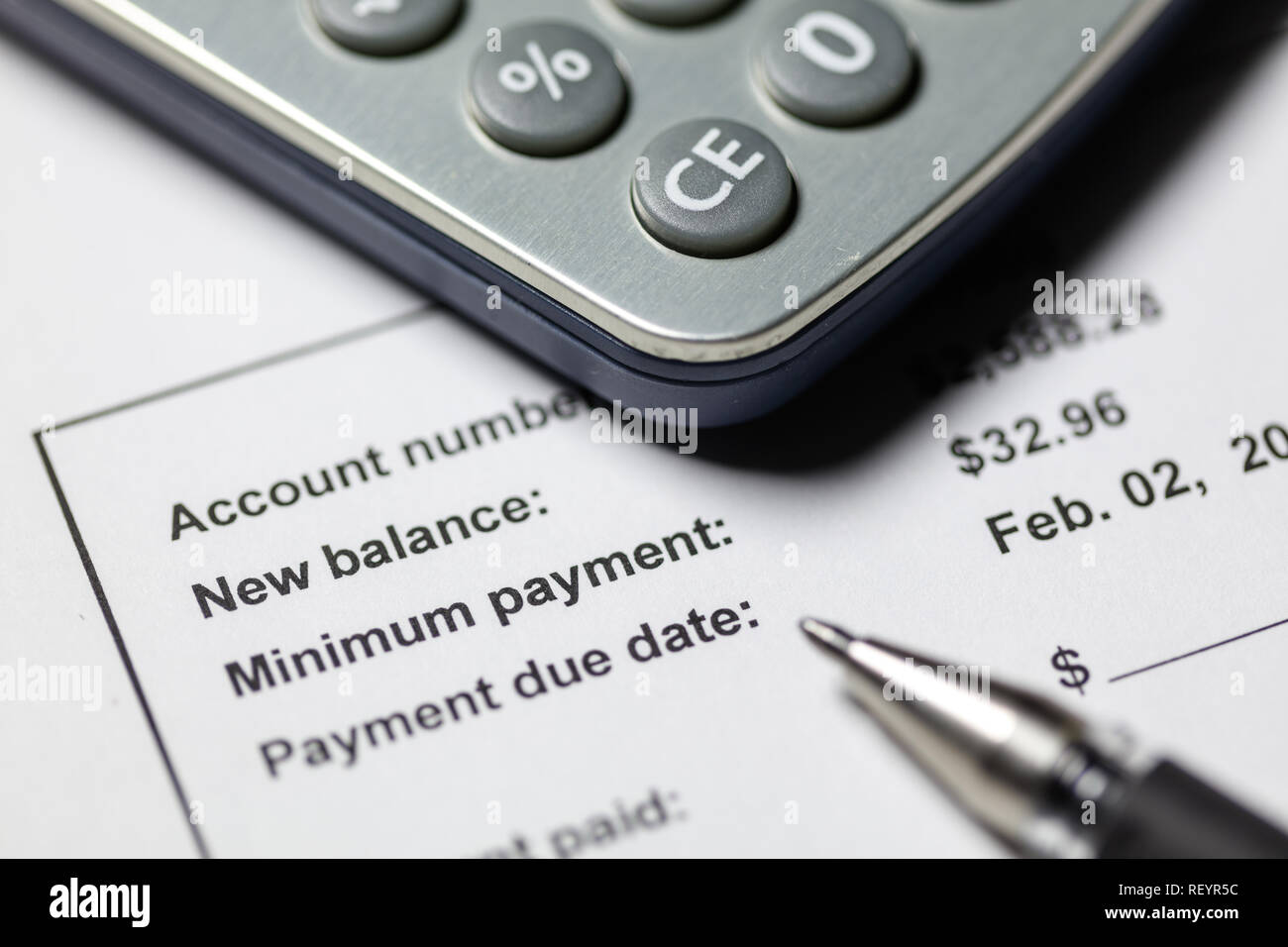 Paying the credit card bill, minimum payment Stock Photo - Alamy