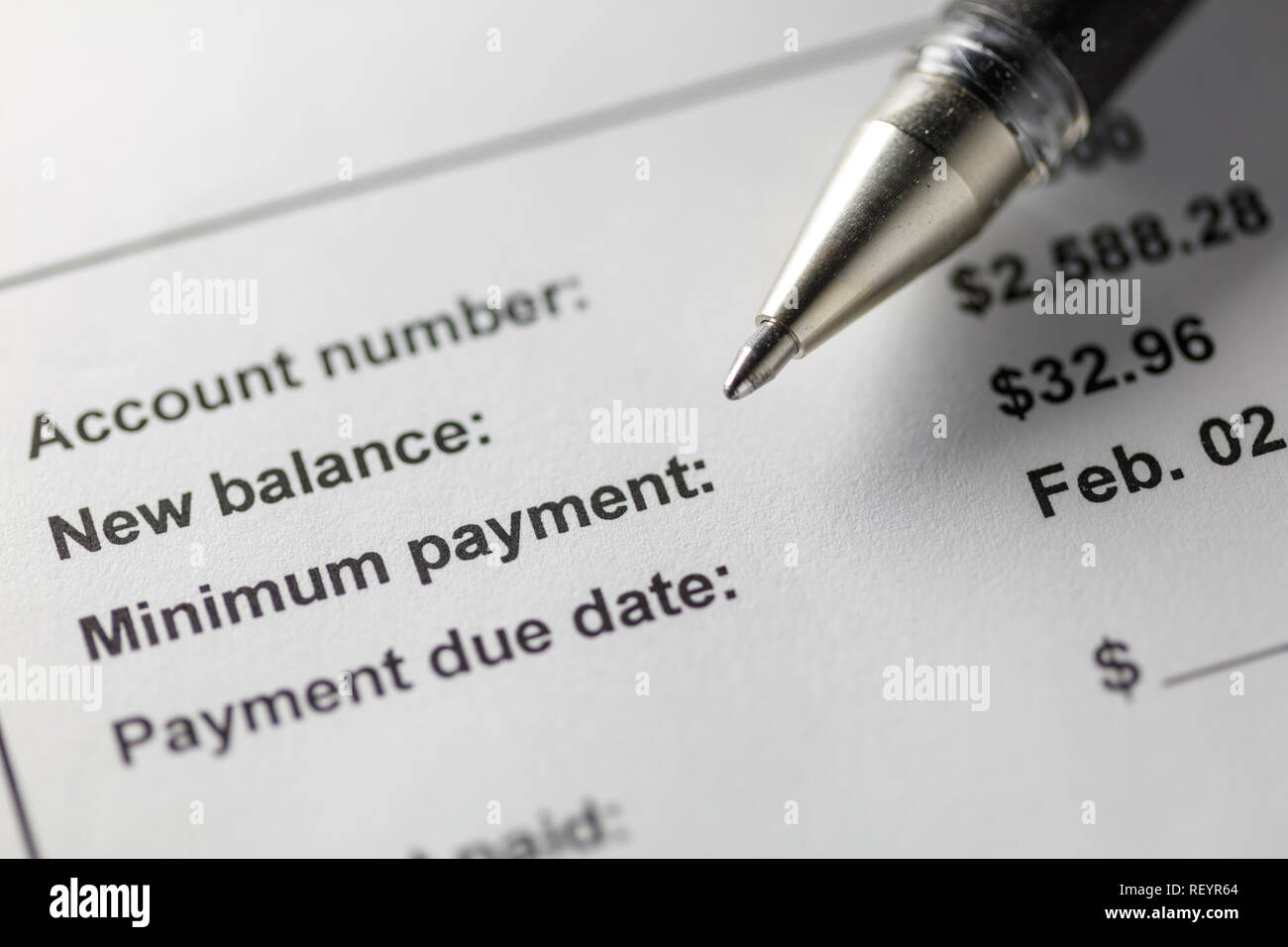 Paying the credit card bill, minimum payment Stock Photo - Alamy