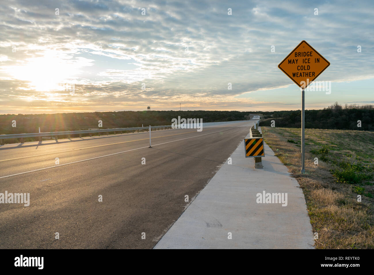 View of Traffic Sign Before a Bridge Durint the Early Hours of the Day ...