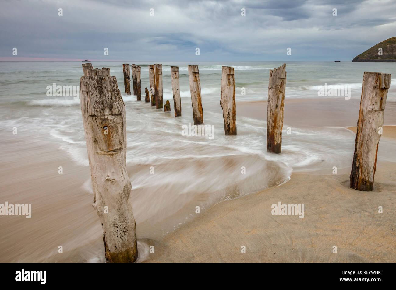 The remains of an old jetty on the beach at St Clair, Dunedin, New ...