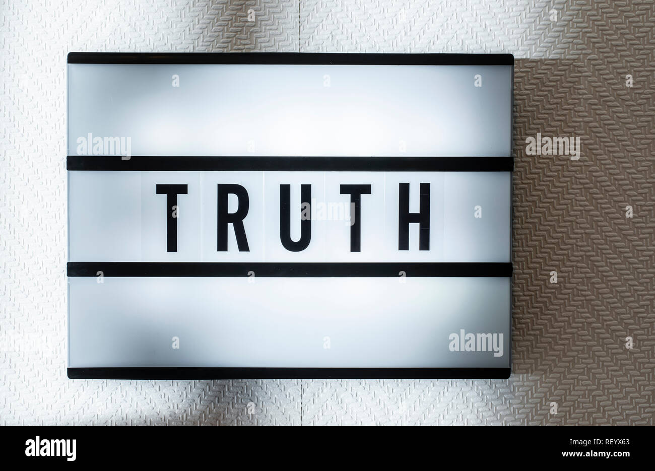 Message Truth on illuminated board. Truthfulness concept with text ...