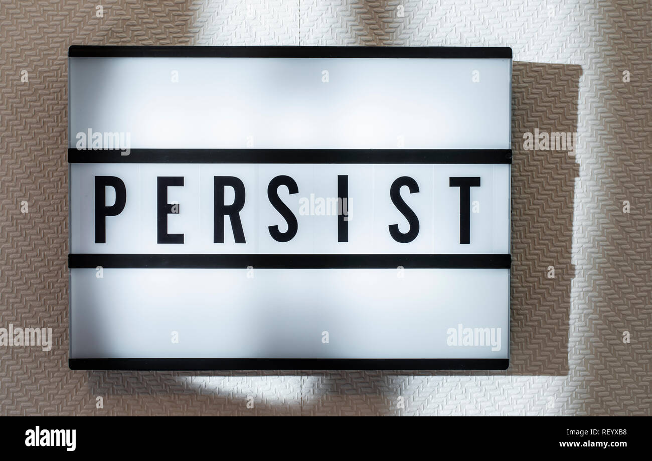 Message Persist on illuminated board. Persistence concept with text ...