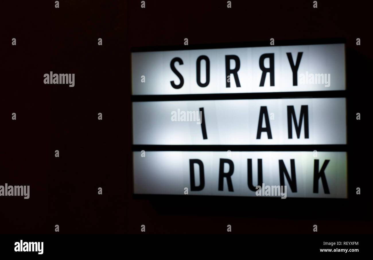 Message Sorry I Am Drunk on illuminated board. Drinking alcohol concept ...
