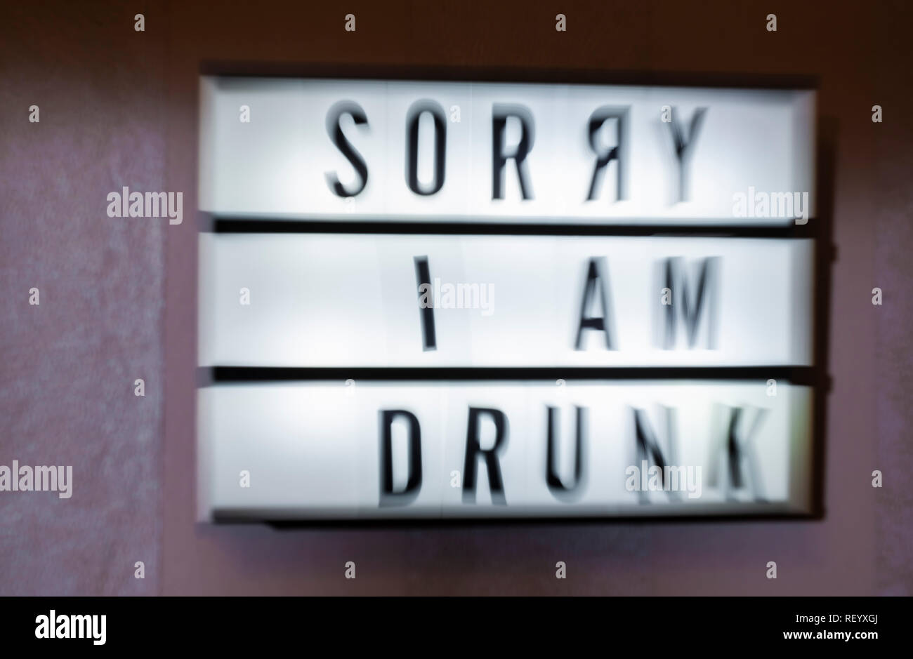 Message Sorry I Am Drunk on illuminated board. Drinking alcohol concept ...