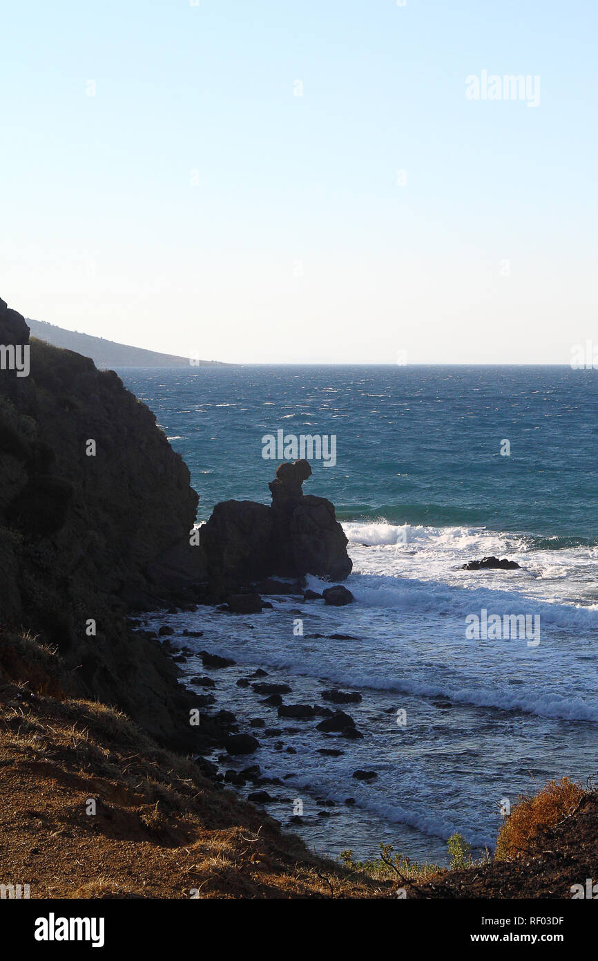 High waves hitting the sea rocks on the coast Stock Photo - Alamy