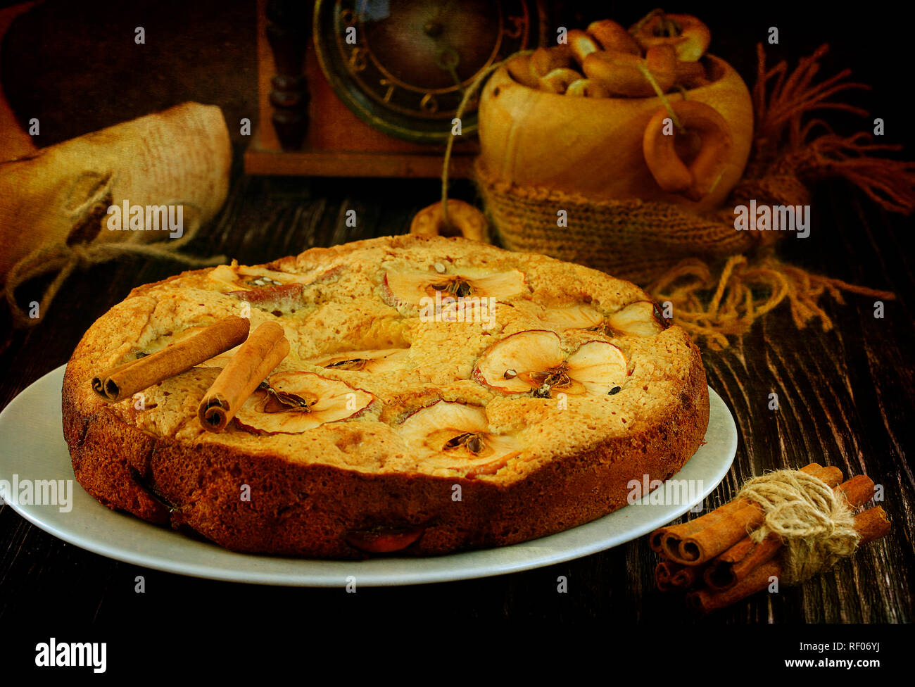 Pie with apples and cinnamon. Charlotte Stock Photo - Alamy