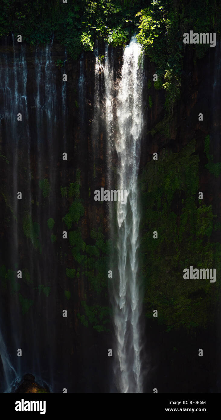 waterfall coban sewu in Java, indonesia. waterfall in tropical forest ...