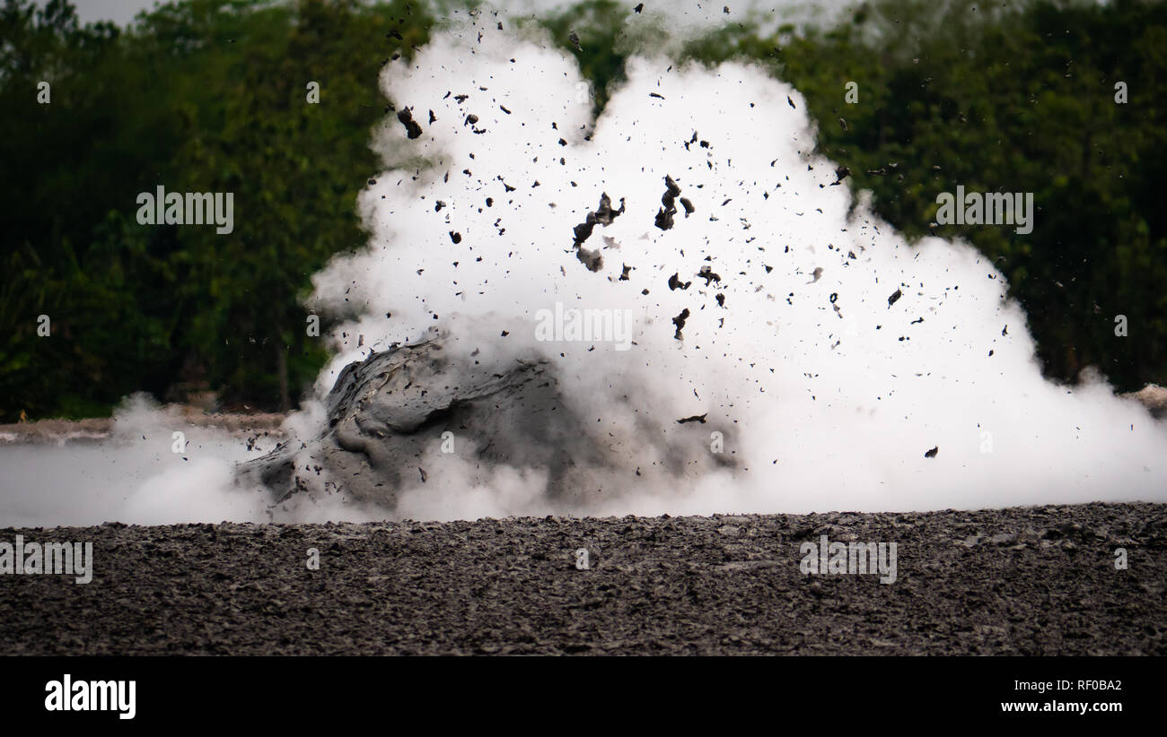 mud volcano with bursting bubble bledug kuwu. volcanic plateau with ...