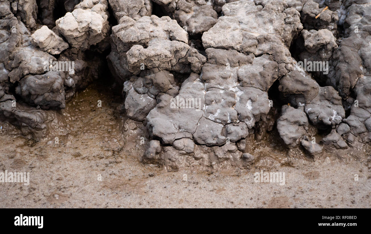 Dry cracked soil, Arid climate. Volcanic landscape around volcano ...