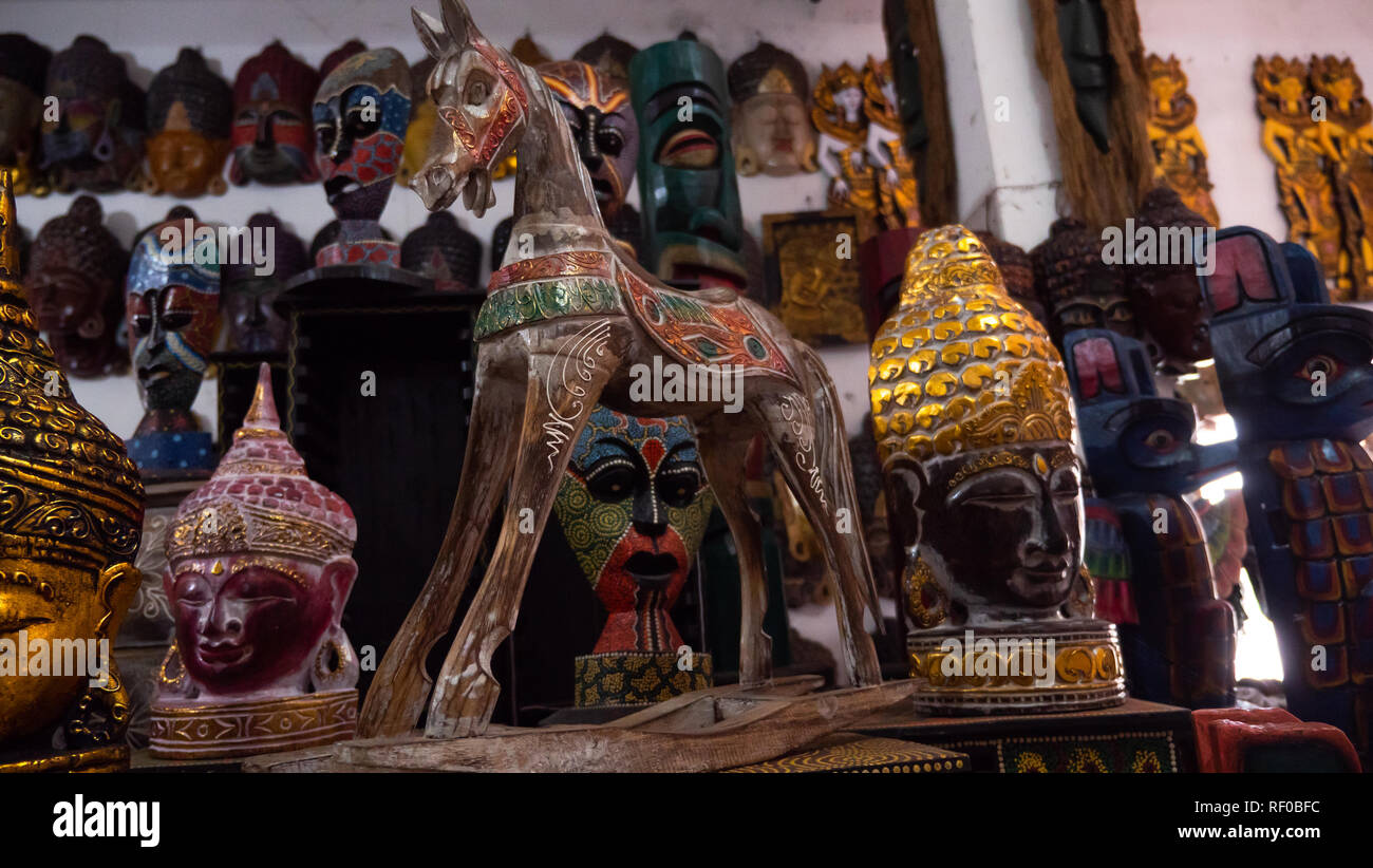 Hindu and Buddhist wooden carving. souvenir shop selling souvenirs and ...