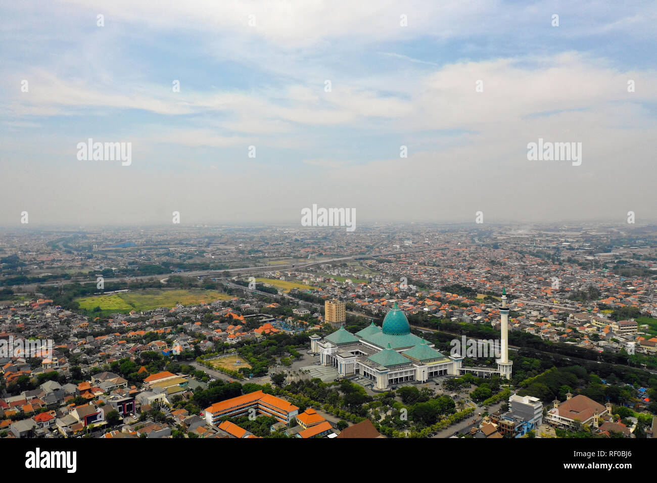 aerial view cityscape city Surabaya with mosque Al Akbar, highway ...