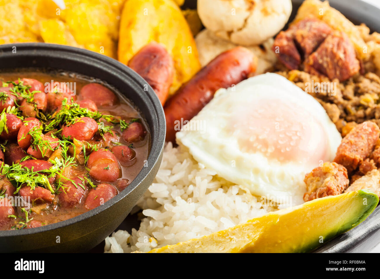 Traditional Colombian dish called Bandeja Paisa: a plate typical of ...