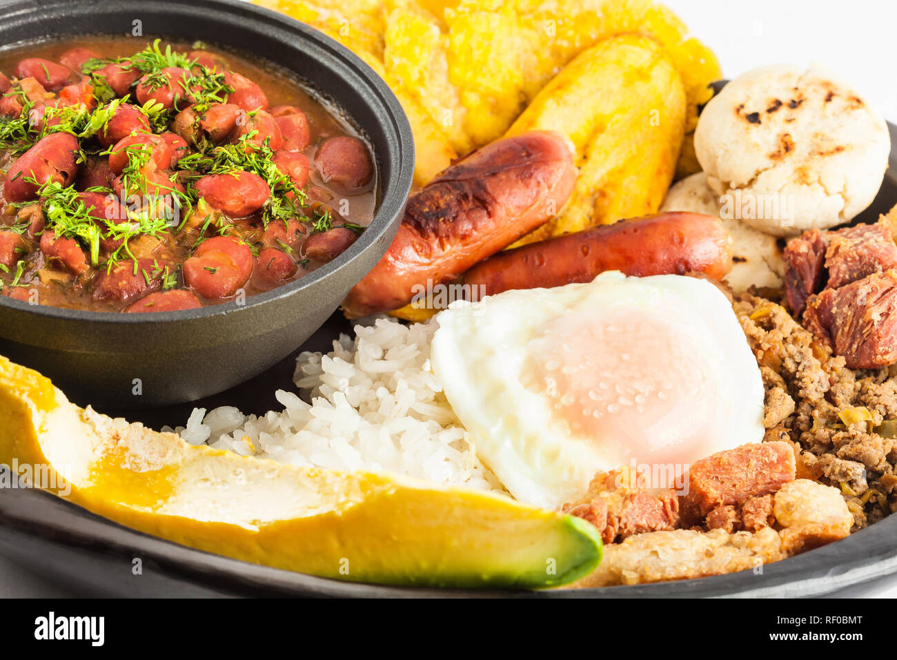 Traditional Colombian dish called Bandeja Paisa: a plate typical of ...